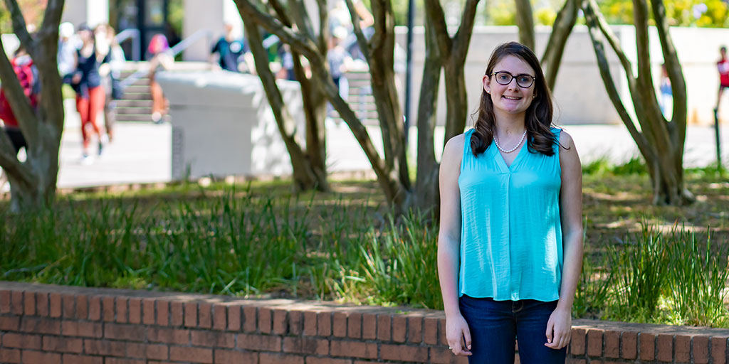 Defying the odds: Andee Poulos overcomes severe brain injury to ...